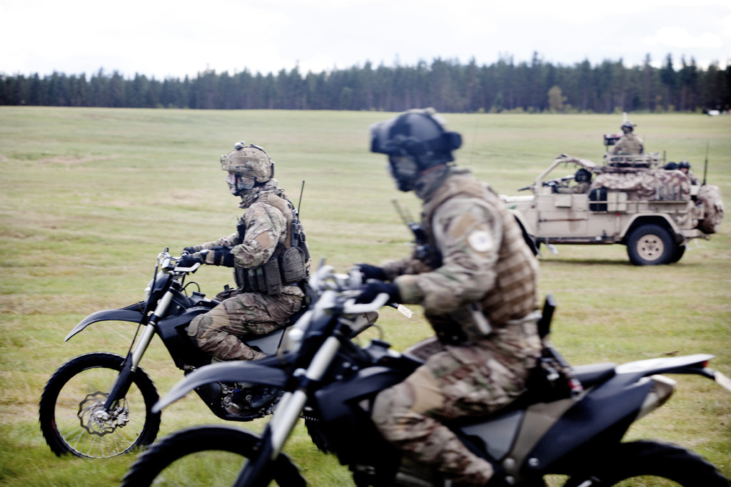An AFSOC Special Tactics Combat Rescue Officer on a Kawasaki KLX110 ...